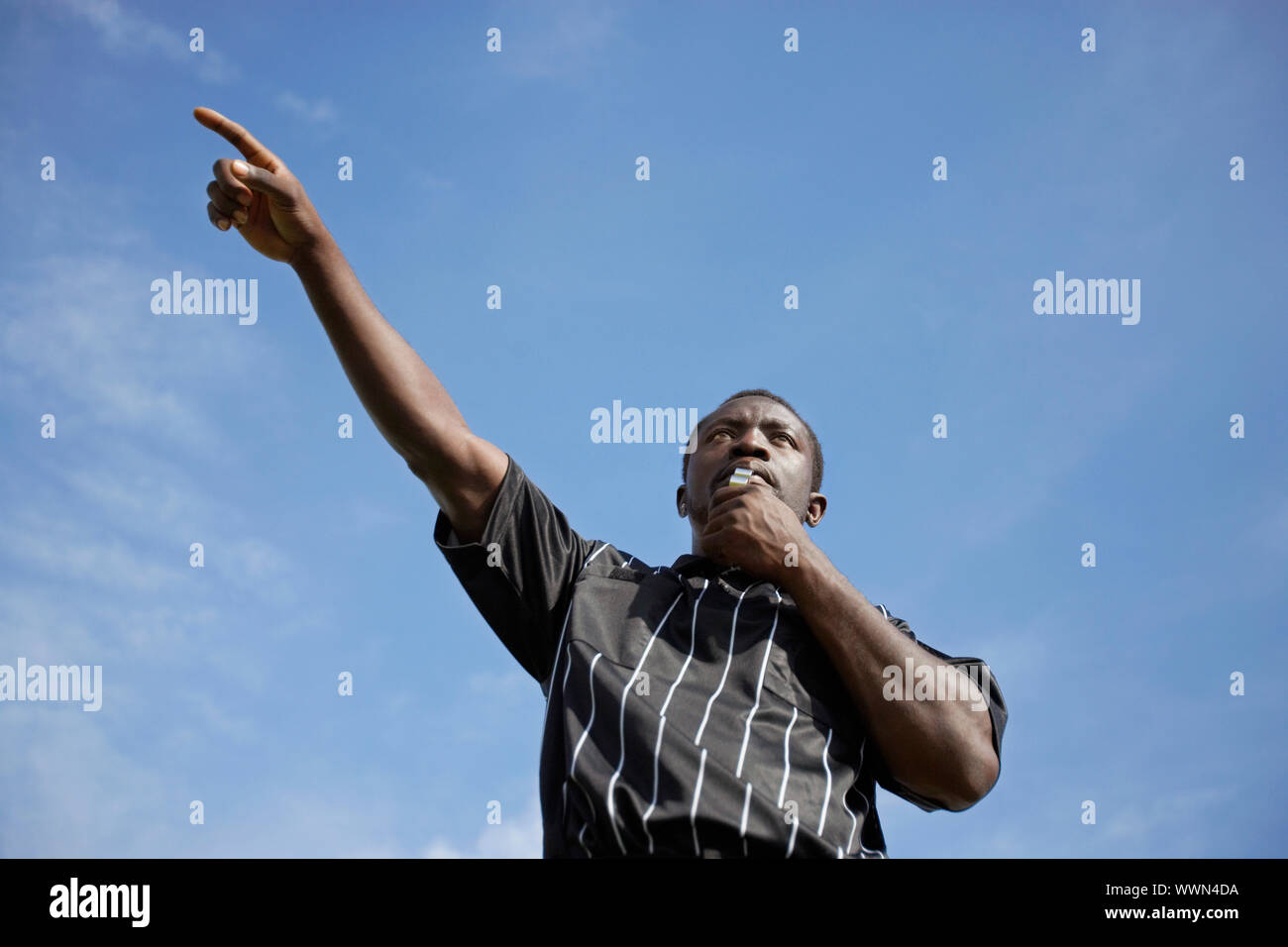 Soccer Referee Making a Call Stock Photo - Alamy