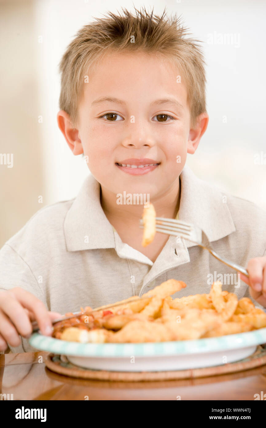 Vietnamese boy eating hi-res stock photography and images - Alamy