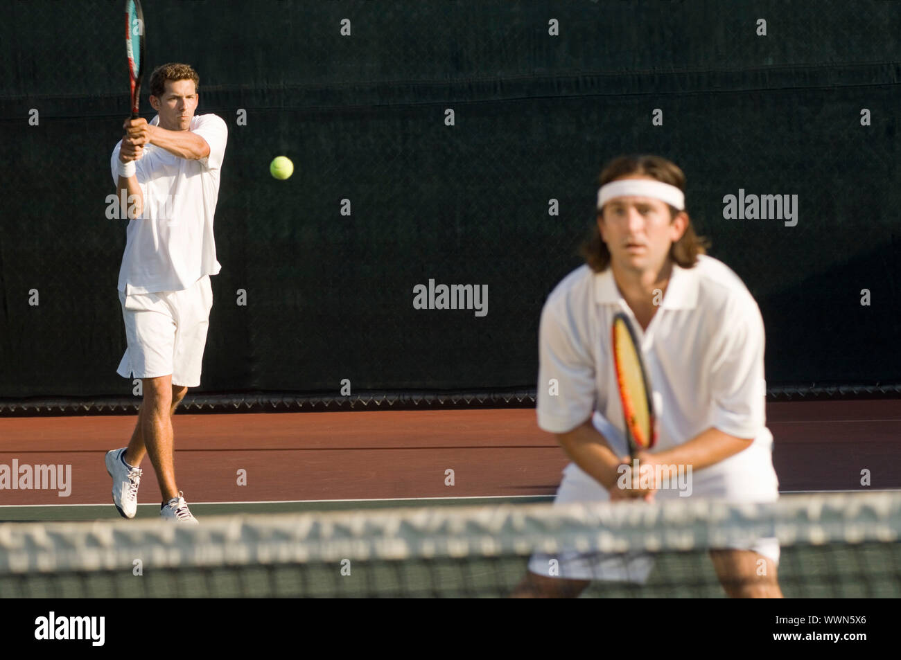 Tennis Player Hitting Backhand Stock Photo - Alamy
