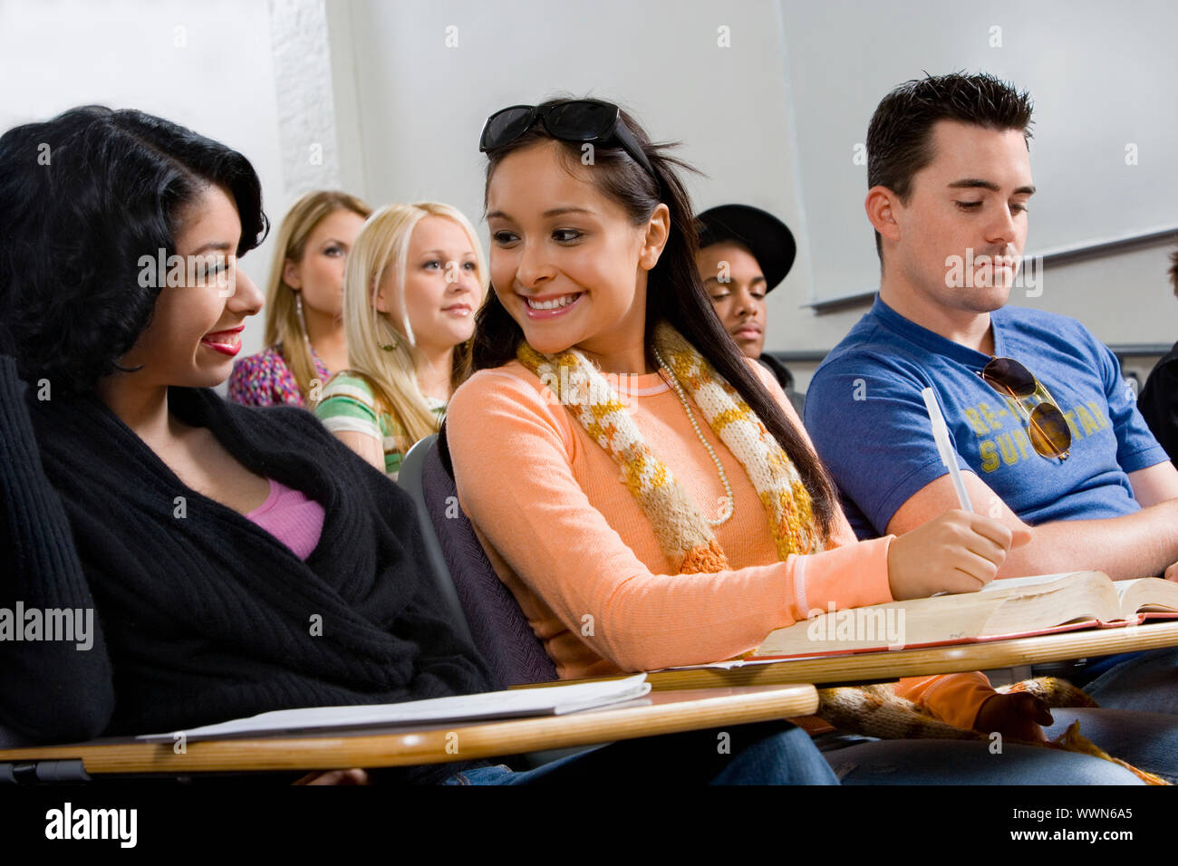 Friends Sitting Together in Class Stock Photo - Alamy