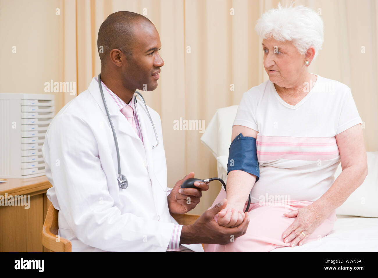 Doctor taking blood gp hi-res stock photography and images - Alamy