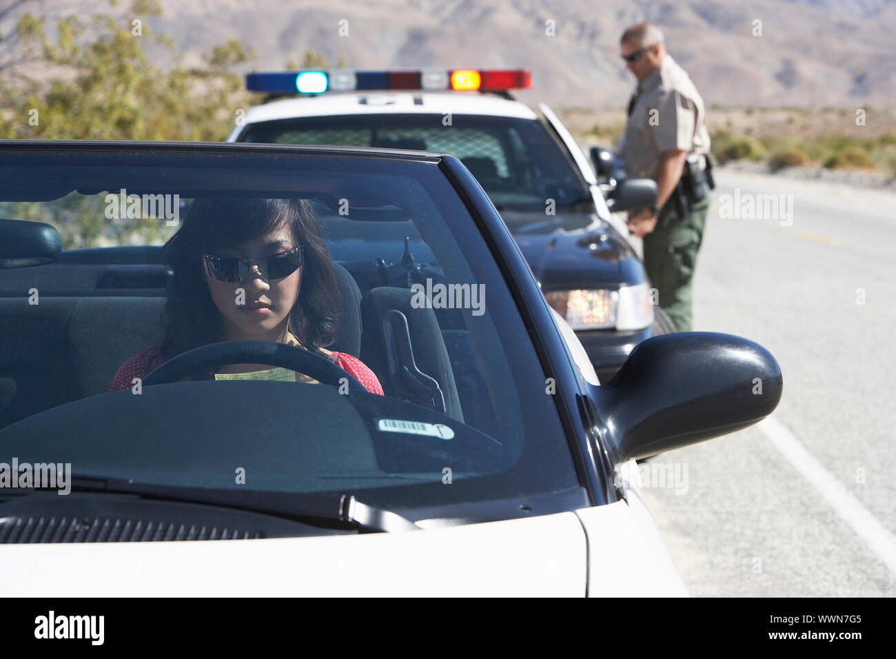 Police officer pulling over car hi-res stock photography and images - Alamy