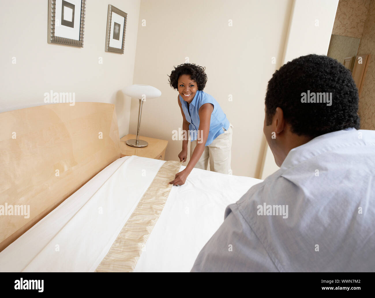 Woman inside is making beds hi-res stock photography and images - Alamy