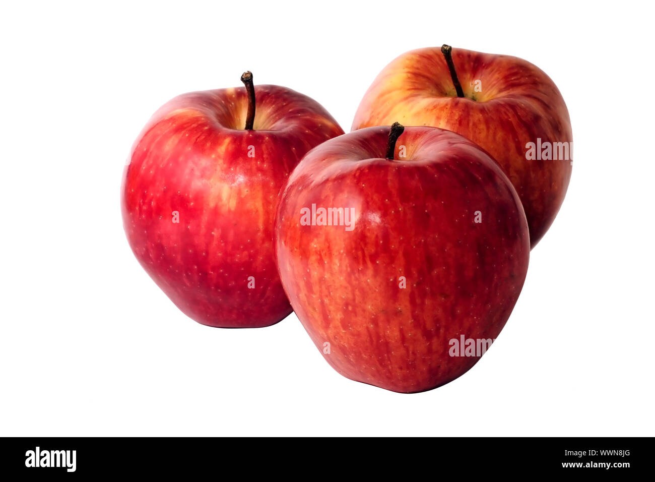 Three apples on a white background Stock Photo - Alamy