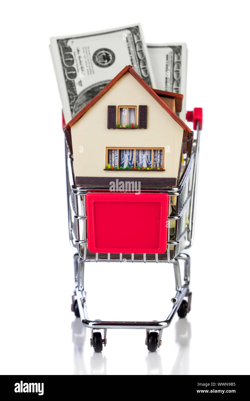 shopping cart and house on a white background Stock Photo - Alamy