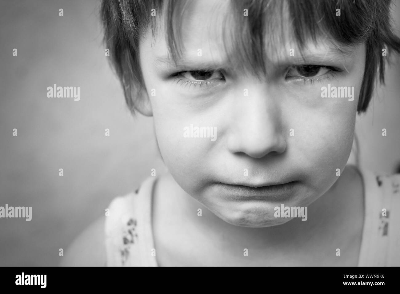 portrait of a sad boy Stock Photo - Alamy