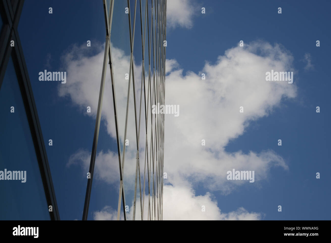 Glass facade with reflection Stock Photo - Alamy