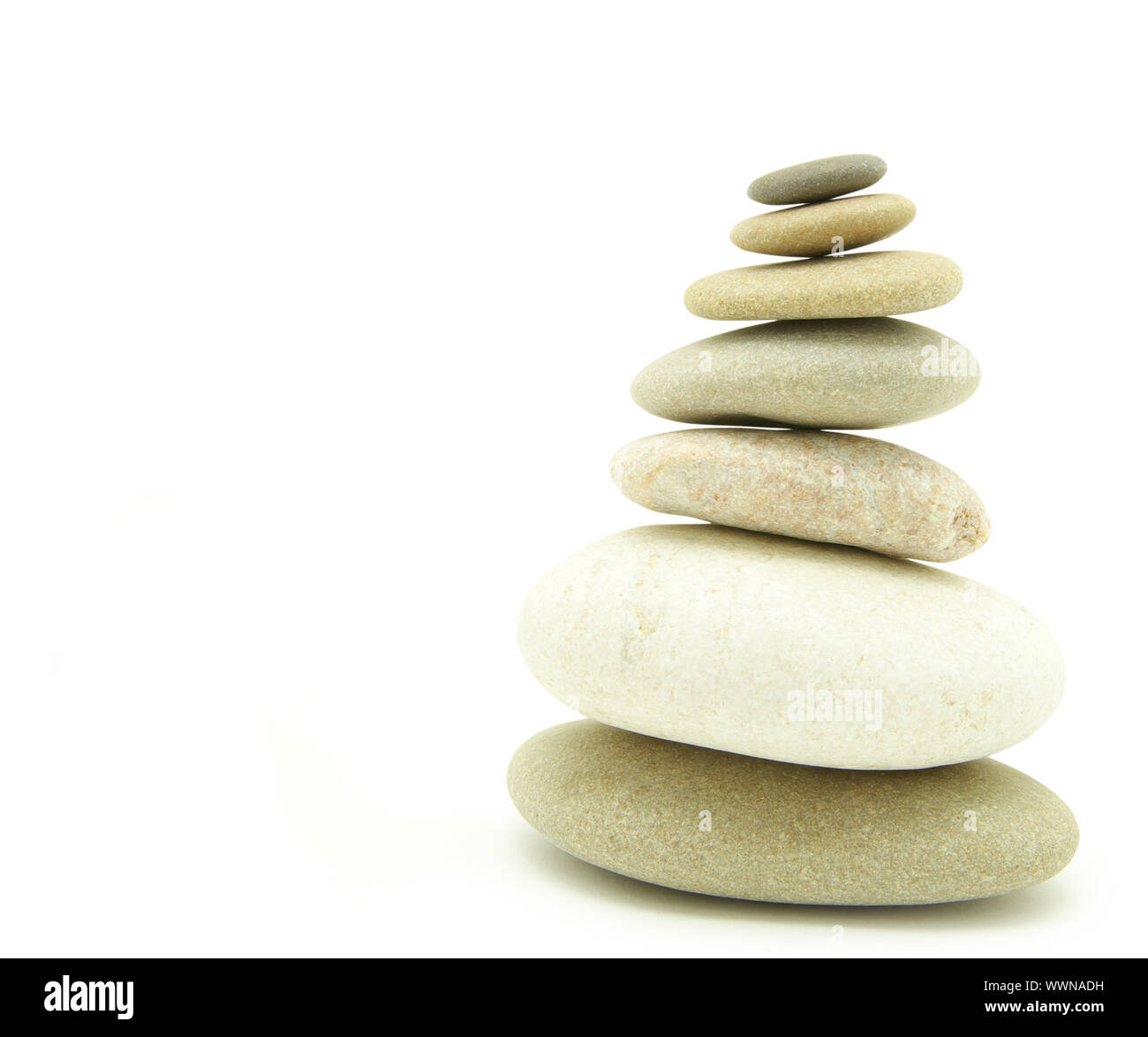 Stack of balanced stones on a white background Stock Photo - Alamy
