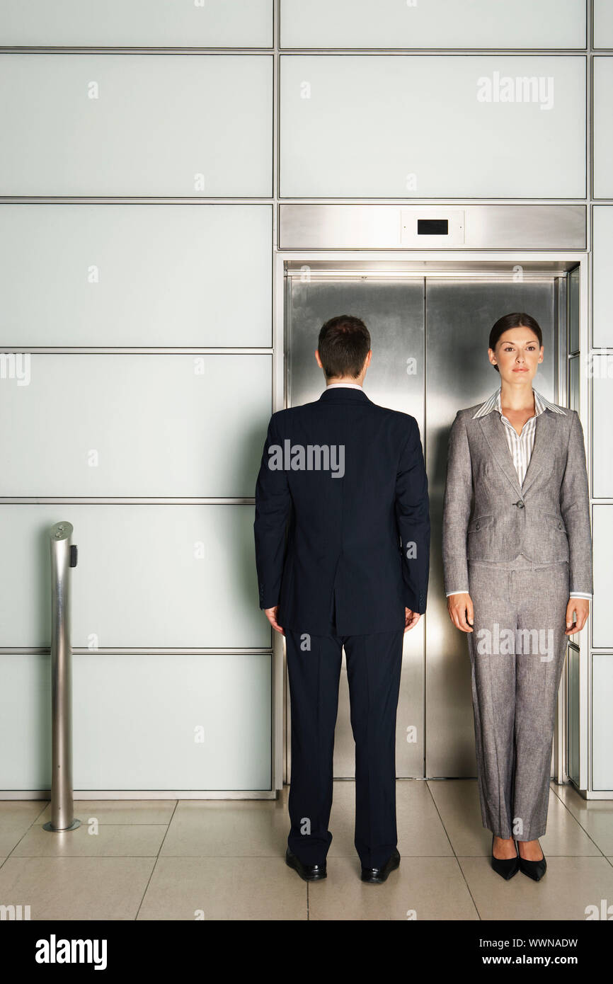 Business People In Elevator