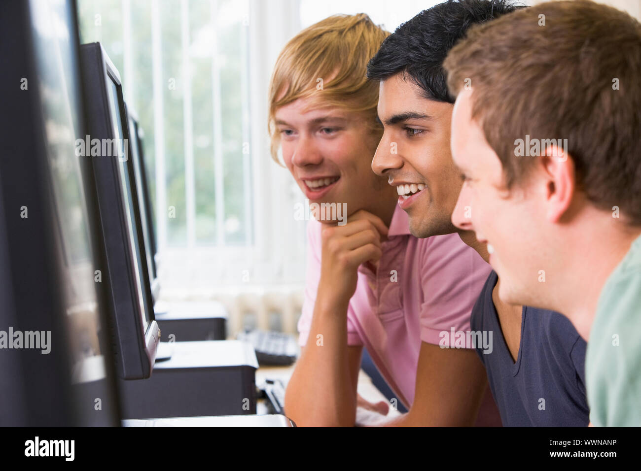 Male college students in a computer lab Stock Photo - Alamy