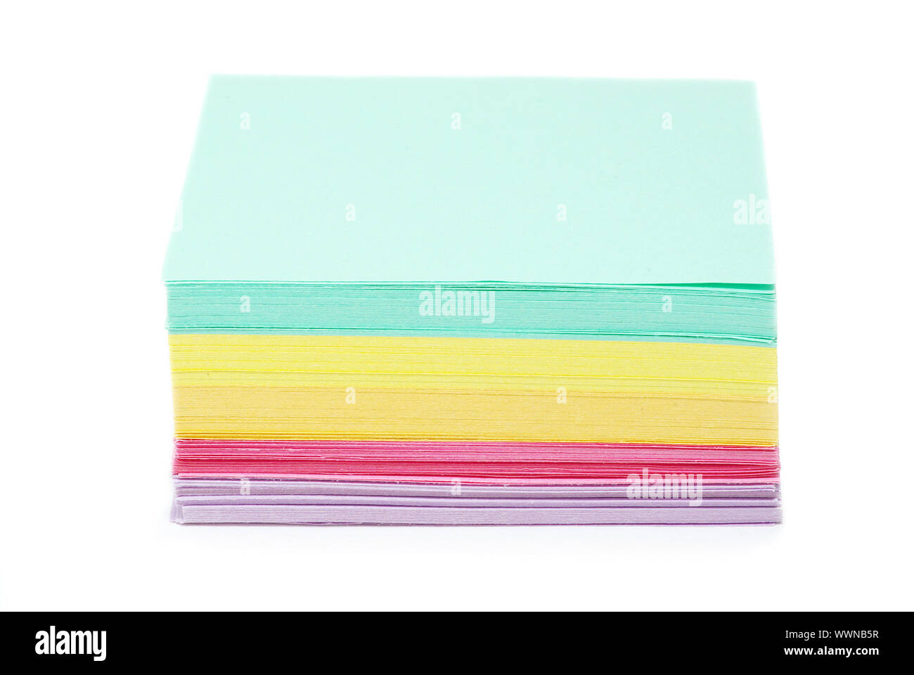 Batch of assorted color paper over white background Stock Photo - Alamy