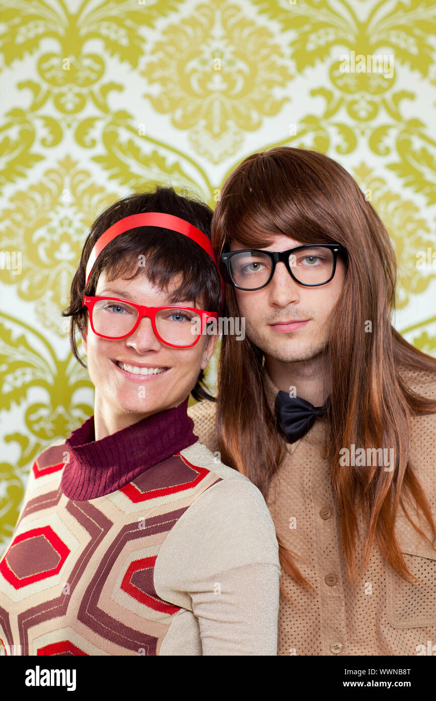 Funny humor silly nerd couple on retro vintage wallpaper background ...