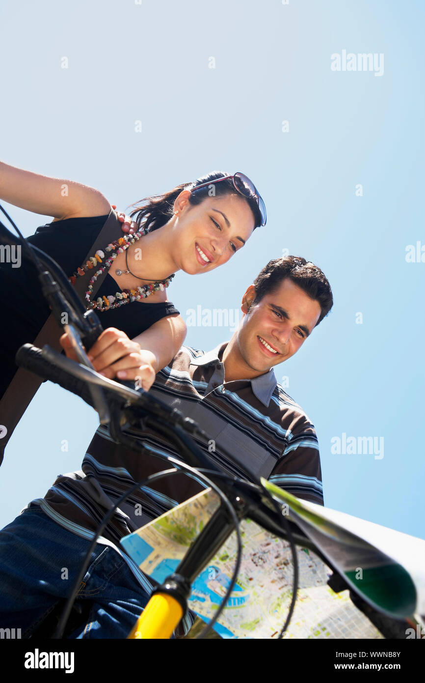 Couple Sharing a Map Stock Photo - Alamy