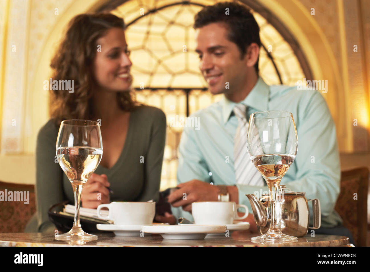 Couple Enjoying Tea Stock Photo - Alamy