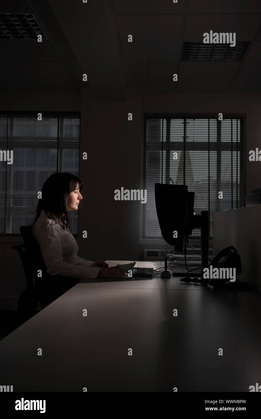 Office Worker Using Computer Stock Photo - Alamy