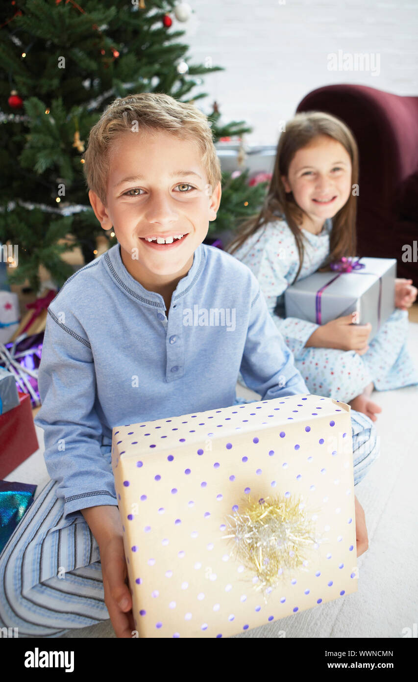 Happy Children with Gifts Stock Photo - Alamy