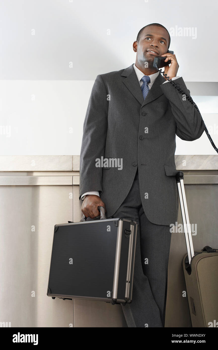Businessman briefcase from below hi-res stock photography and images ...