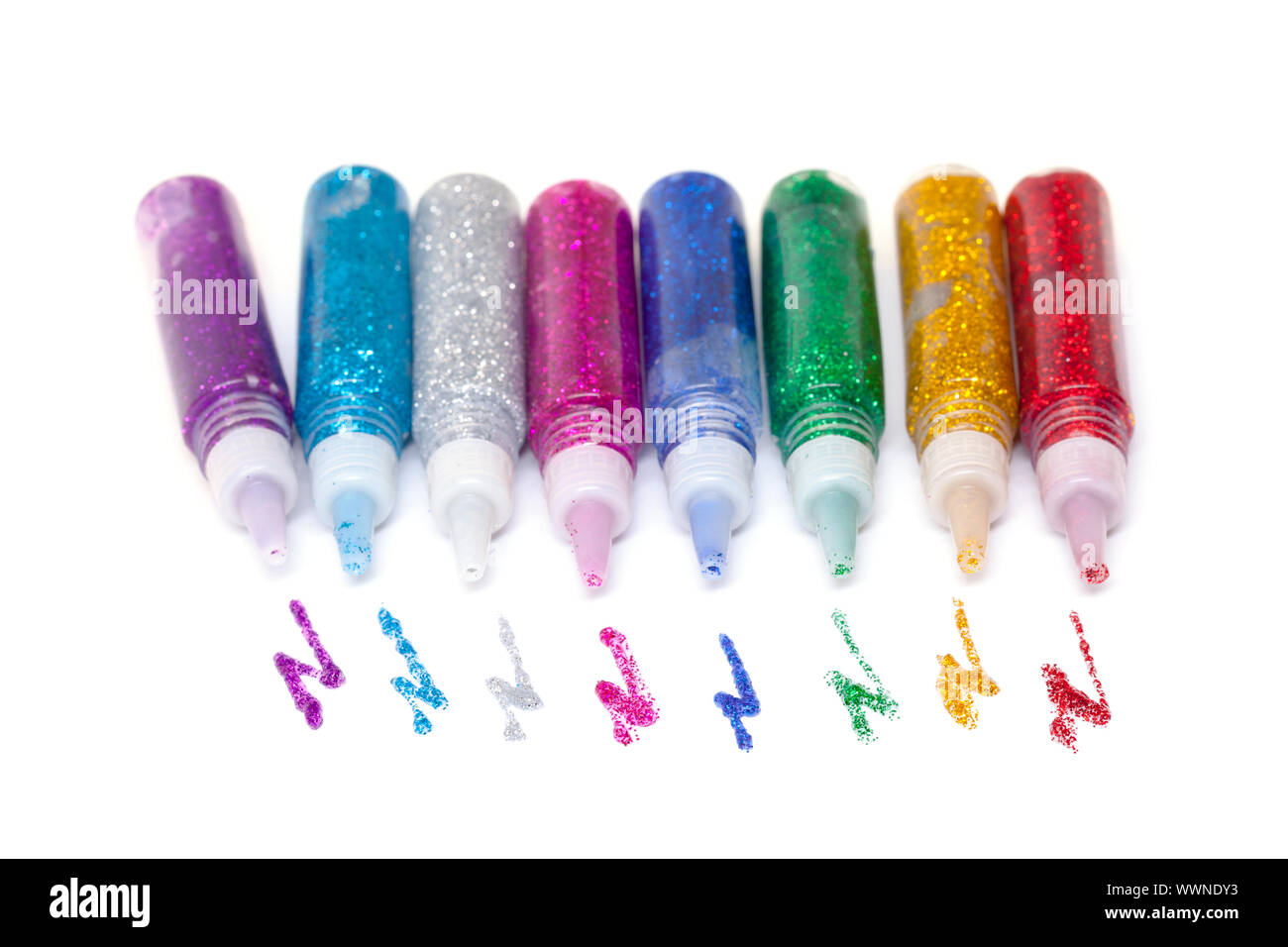 Set Colorful sparkle glue pens on white background Stock Photo - Alamy