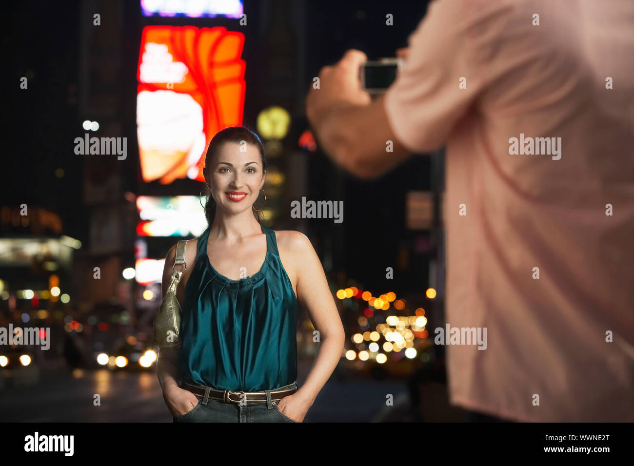Woman posing at times square hi-res stock photography and images - Alamy
