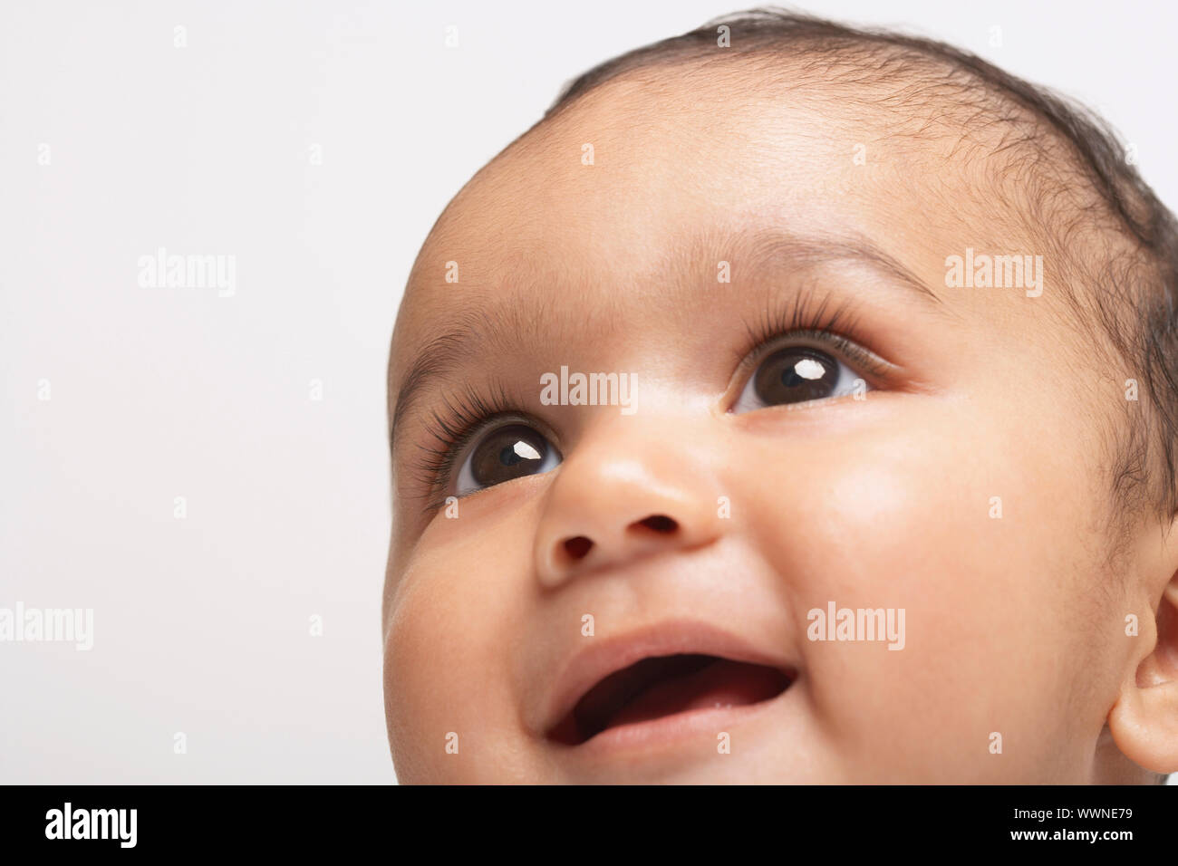 Baby Looking Up Stock Photo - Alamy