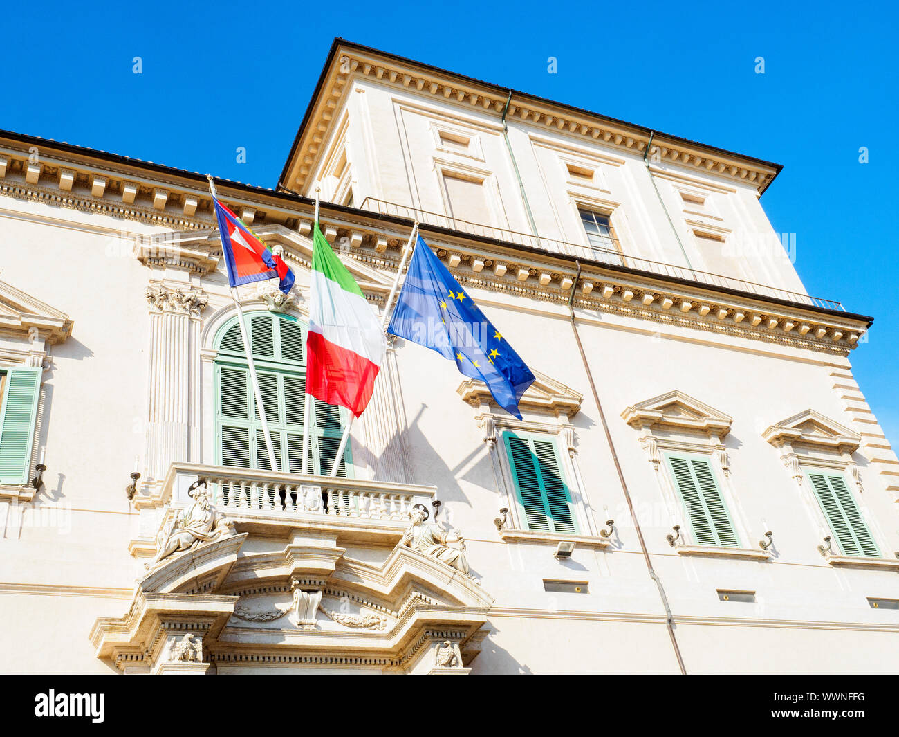The Italian national flag flies against sky above the presidential ...