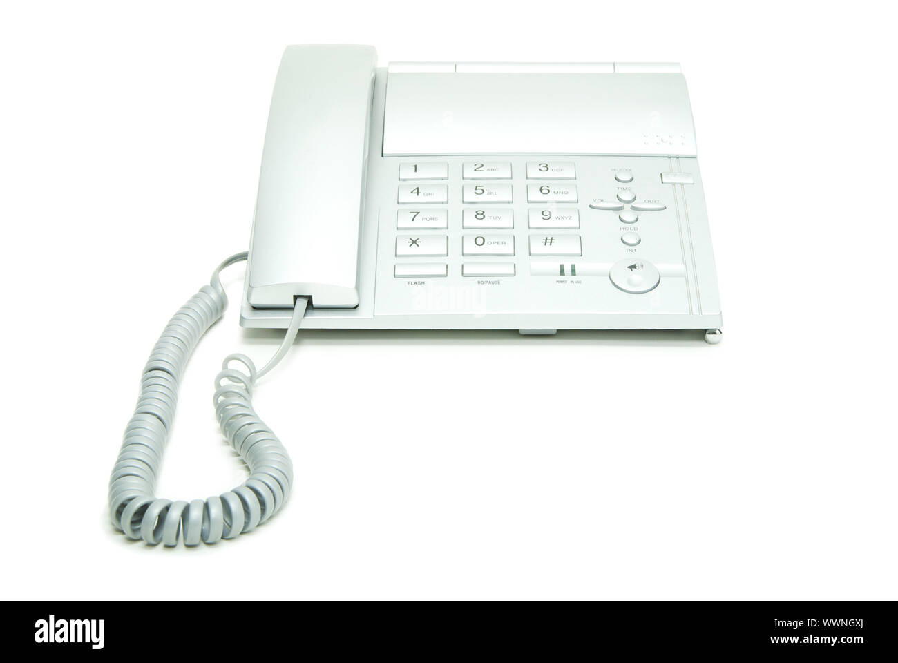grey office telephone on a white background Stock Photo - Alamy