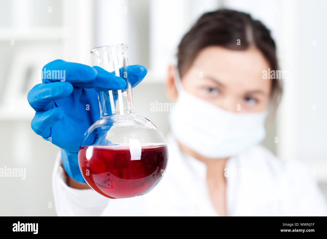 chemist working in laboratory with scientists equipment Stock Photo - Alamy