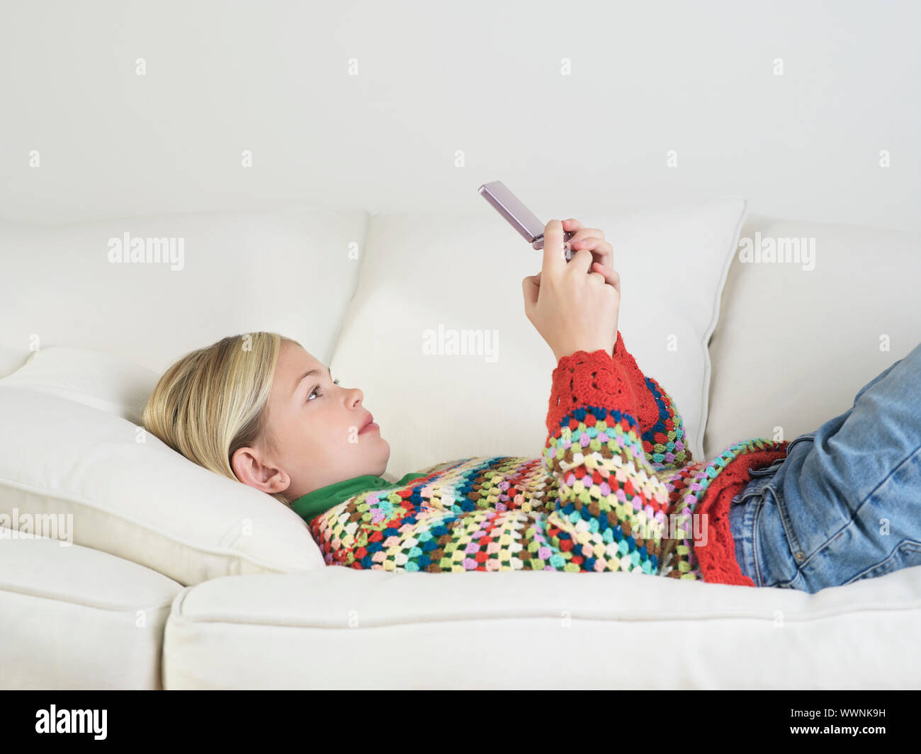 Girl Playing Handheld Video Game Stock Photo - Alamy