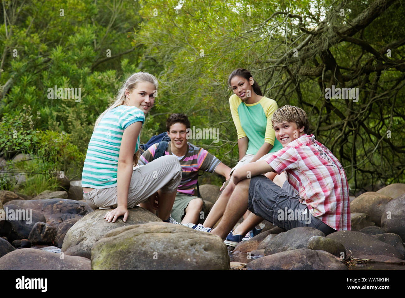 Black people sitting on creek hi-res stock photography and images - Alamy