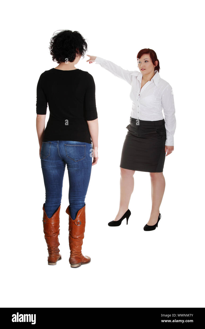 Businesswoman giving reprimand to worker. Isolated on white Stock Photo ...