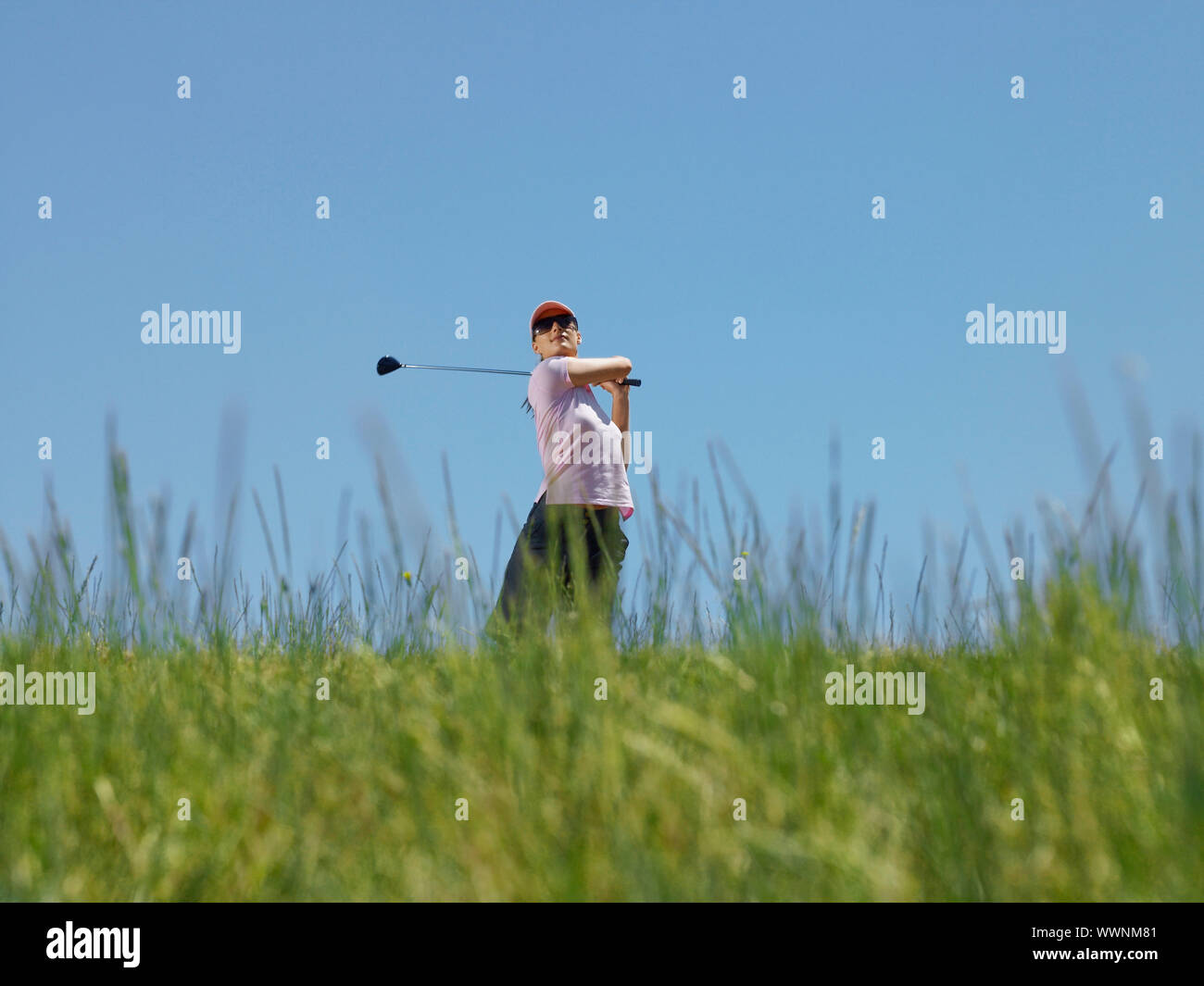 Golfer Driving Ball Stock Photo - Alamy