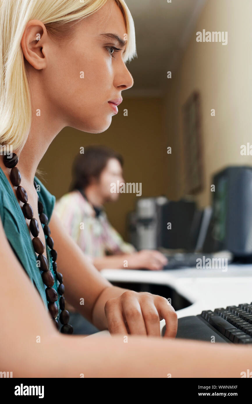 Woman in Computer Lab Stock Photo - Alamy