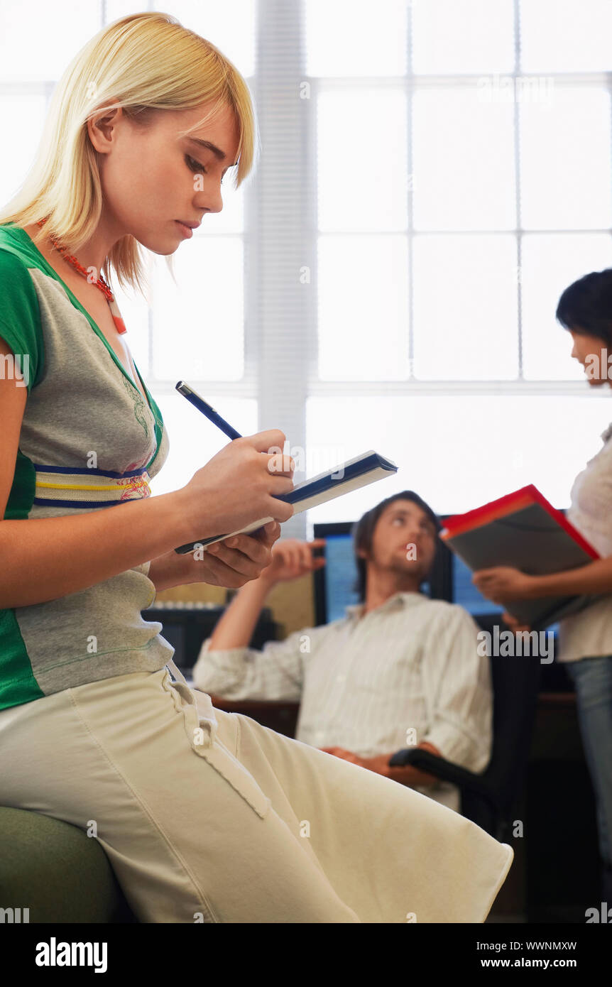 Woman Talking Notes Stock Photo - Alamy
