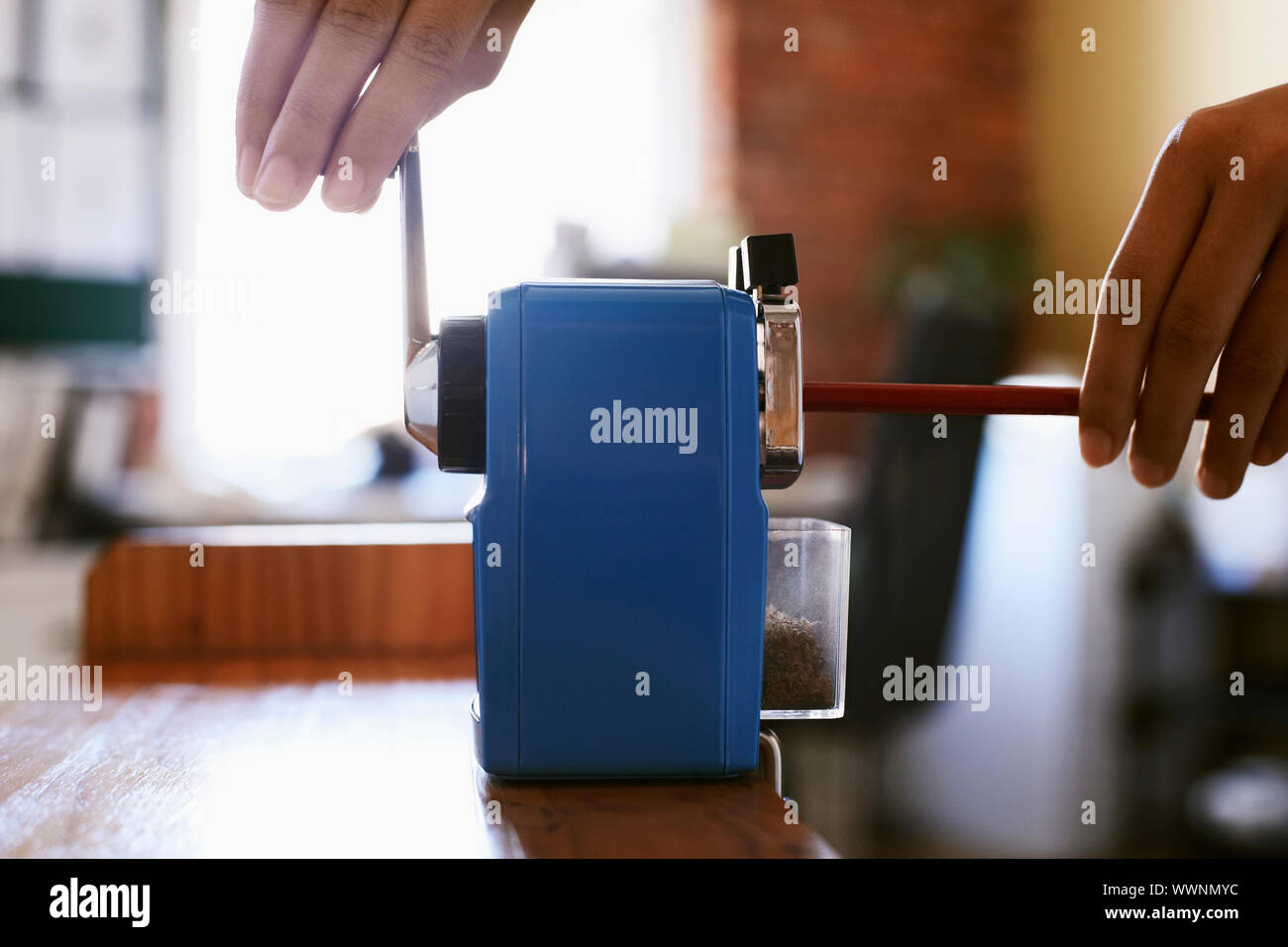 Man sharpening pencil hi-res stock photography and images - Alamy