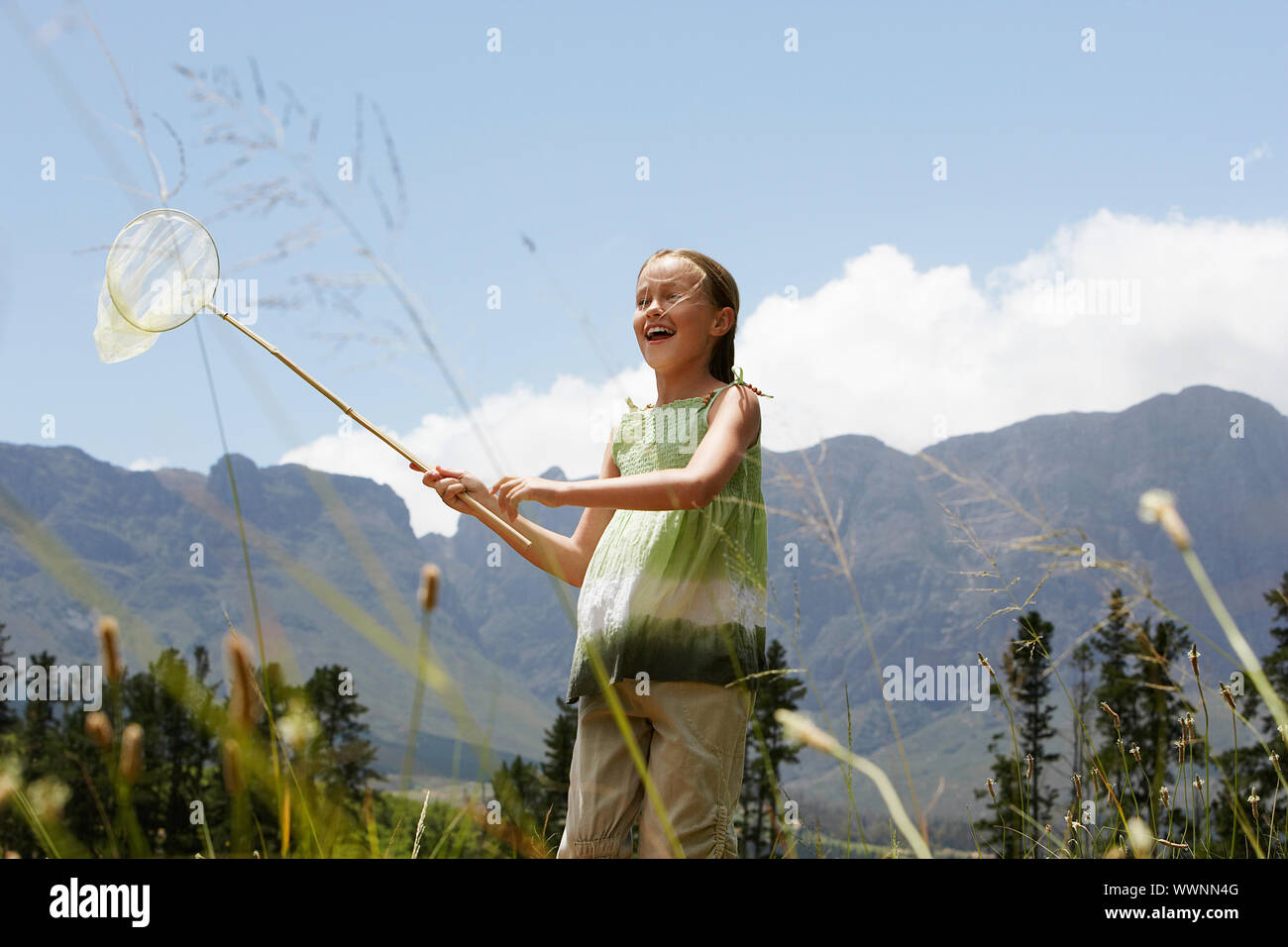 Girl Catching Bugs Stock Photo - Alamy
