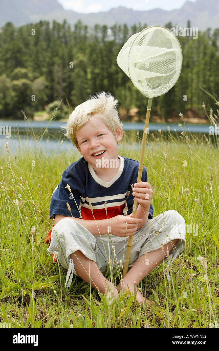 Boy Catching Bugs Stock Photo - Alamy