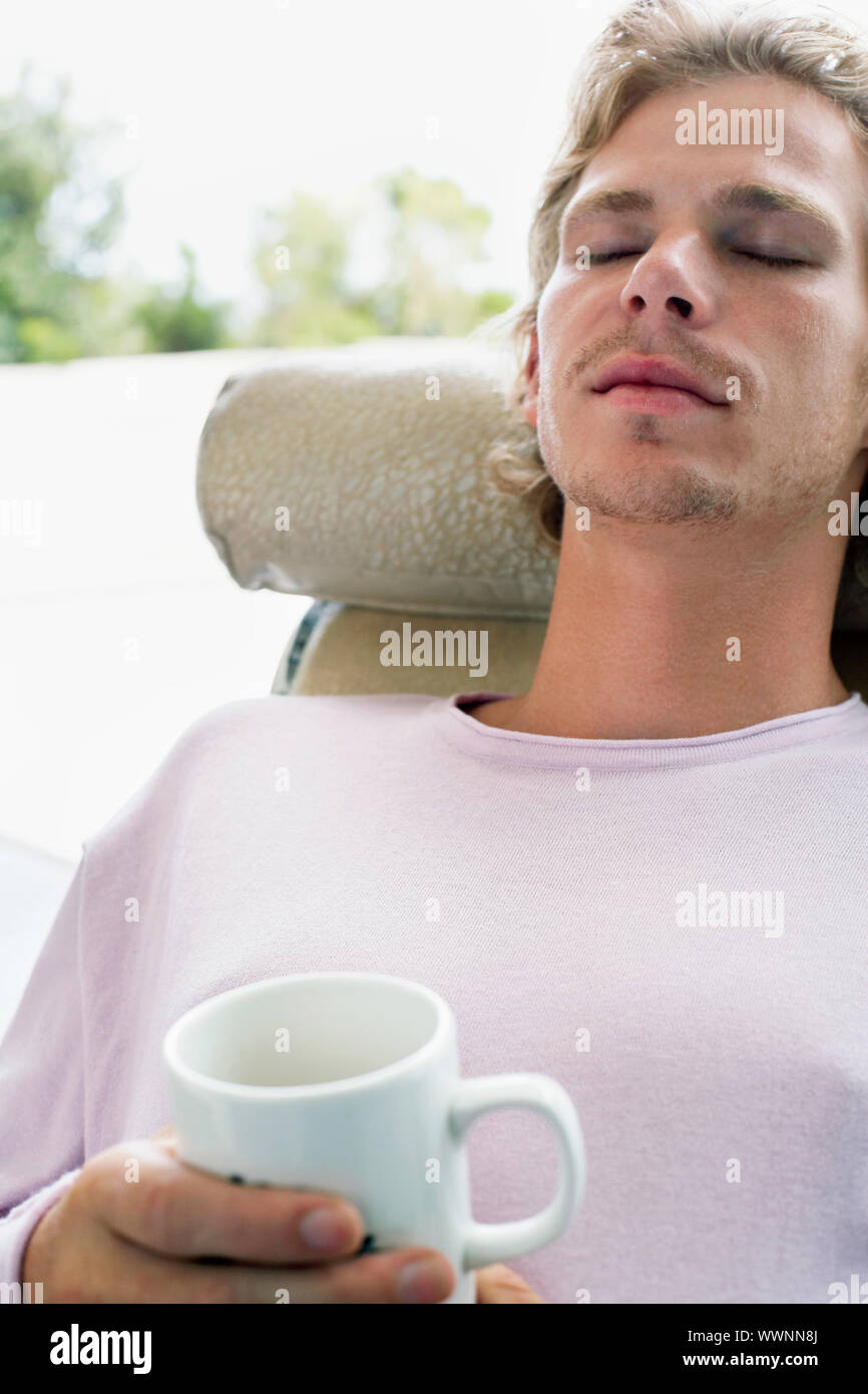Man Taking a Nap Stock Photo - Alamy