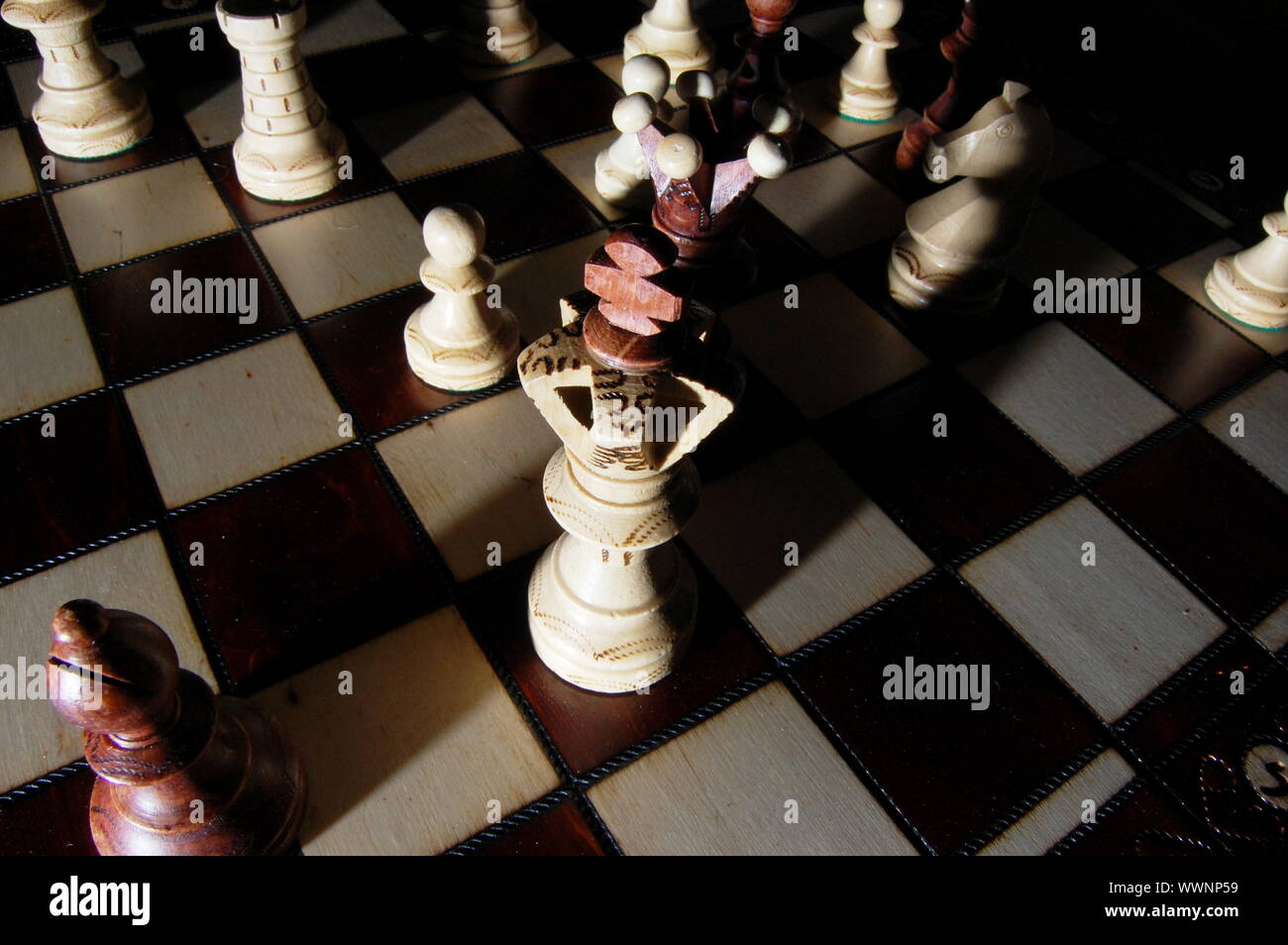 chess pieces on chess board showing power and success Stock Photo - Alamy
