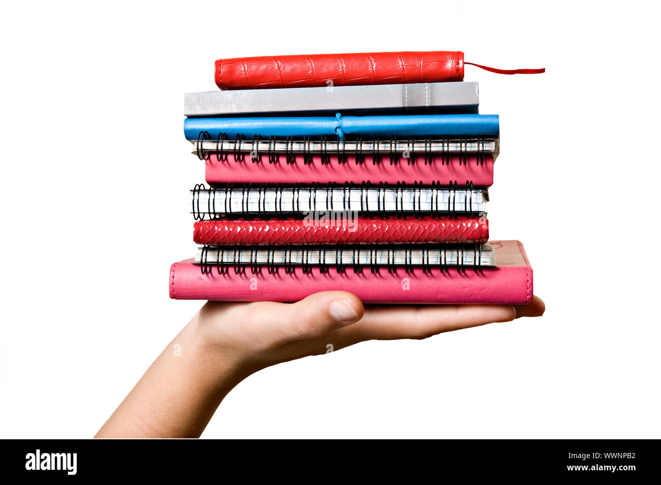 Stack of books in hand on white background Stock Photo - Alamy