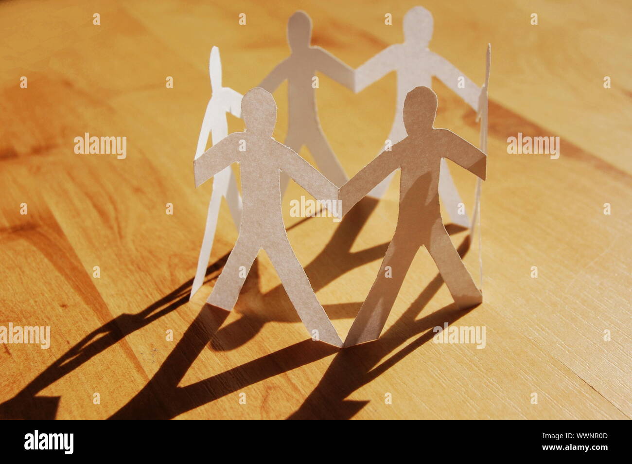 paper man showing concept for business teamwork and love Stock Photo ...