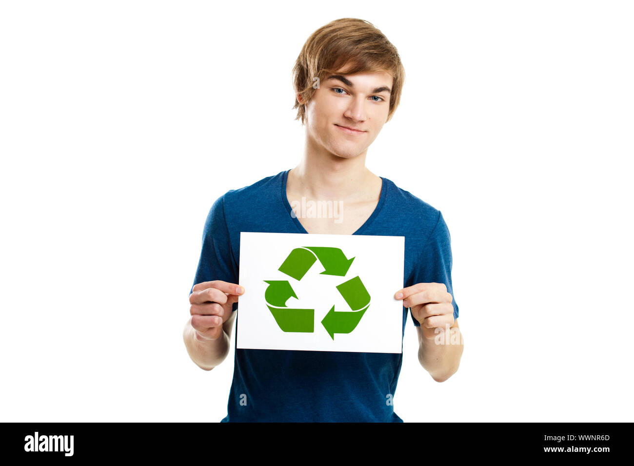 Casual young man holding a recycling sign to promote a green and better ...