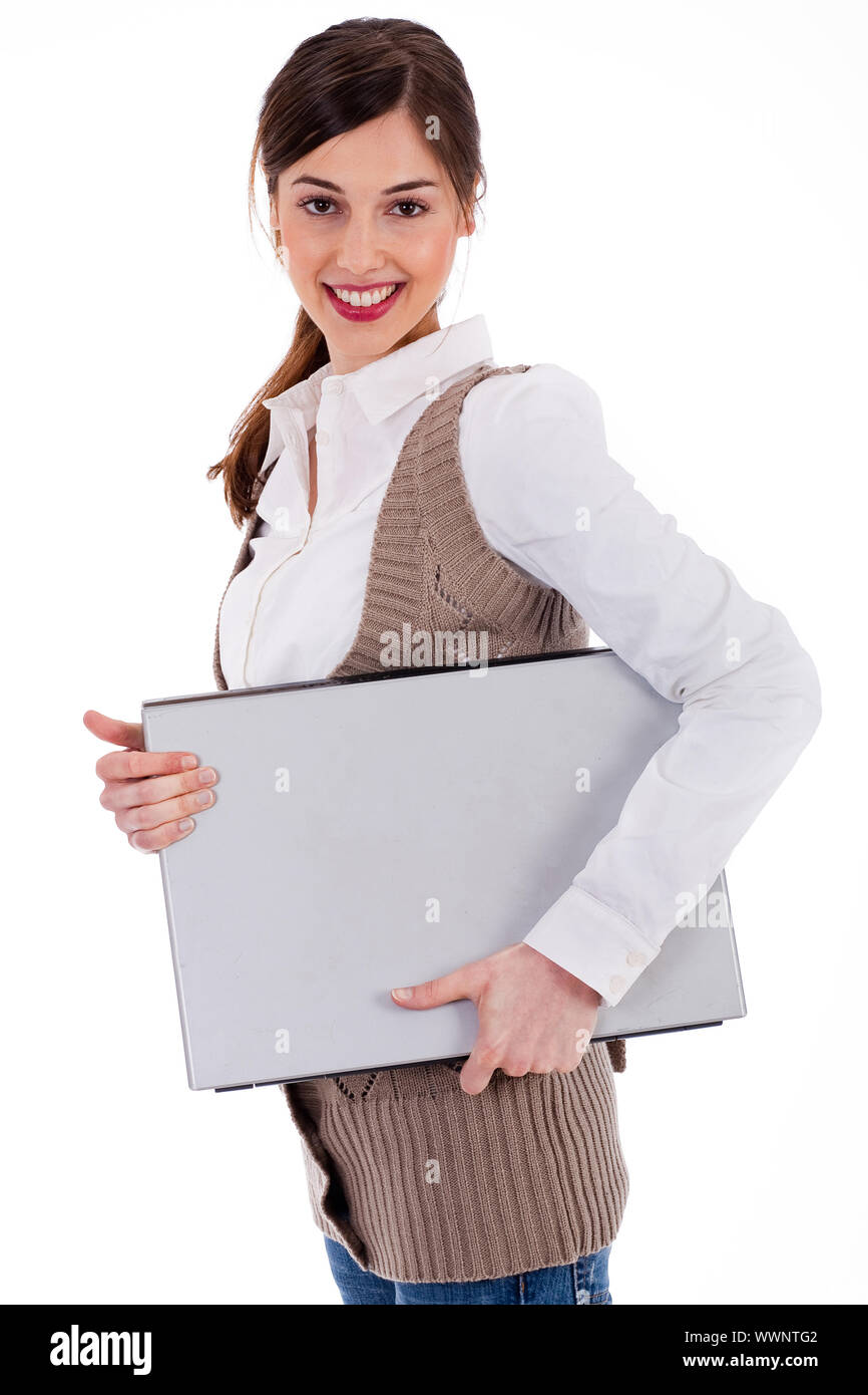 Cute model carrying a laptop with her on a white isolated background ...
