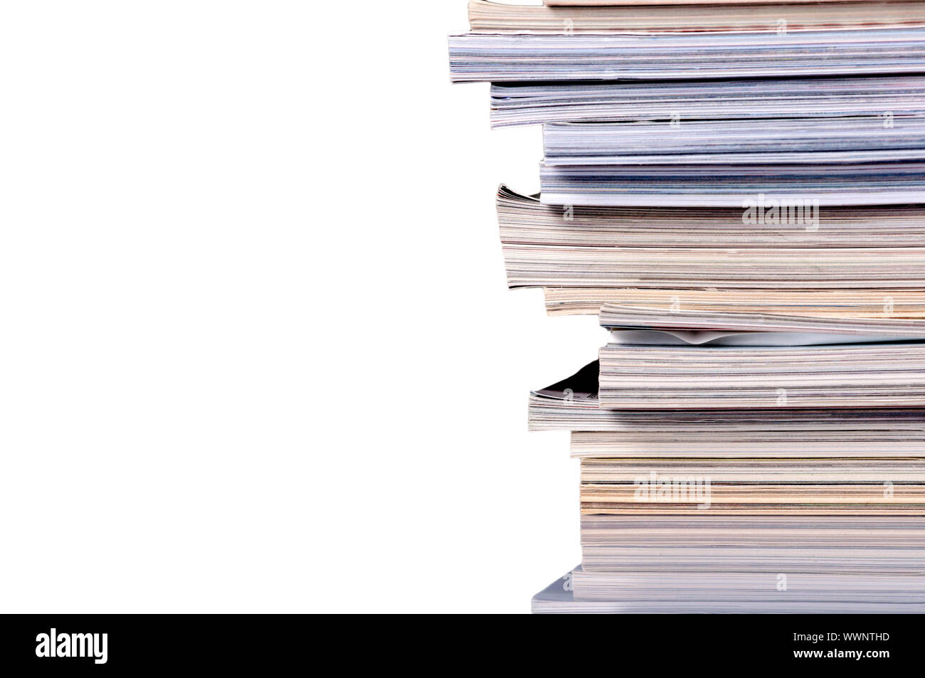 Isolated pile of magazines Stock Photo - Alamy