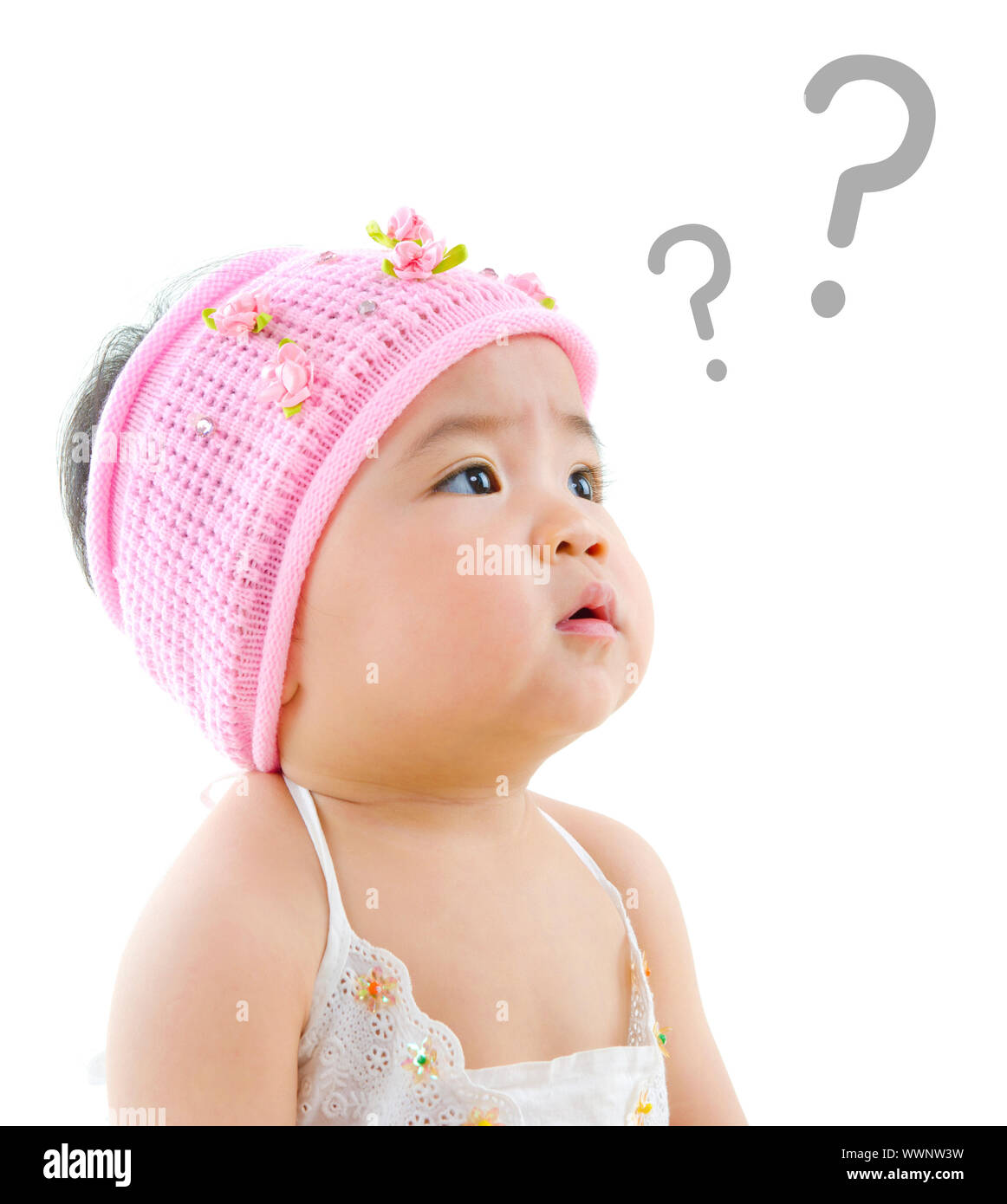 Wondering pan Asian baby girl with question mark isolated on white ...