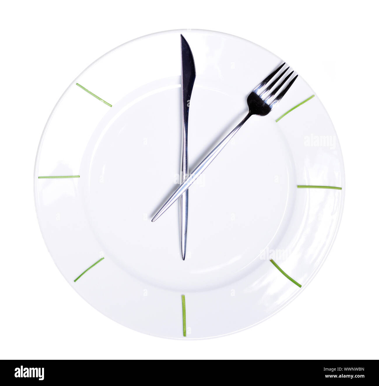 Clock made of knife and fork, isolated on white background Stock Photo ...