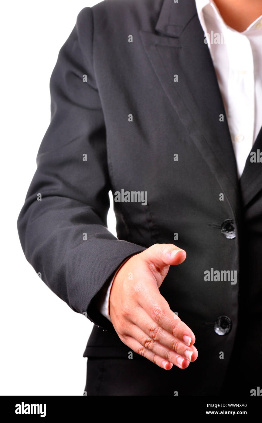 Businessperson, in suite, ready to give an handshake Stock Photo - Alamy