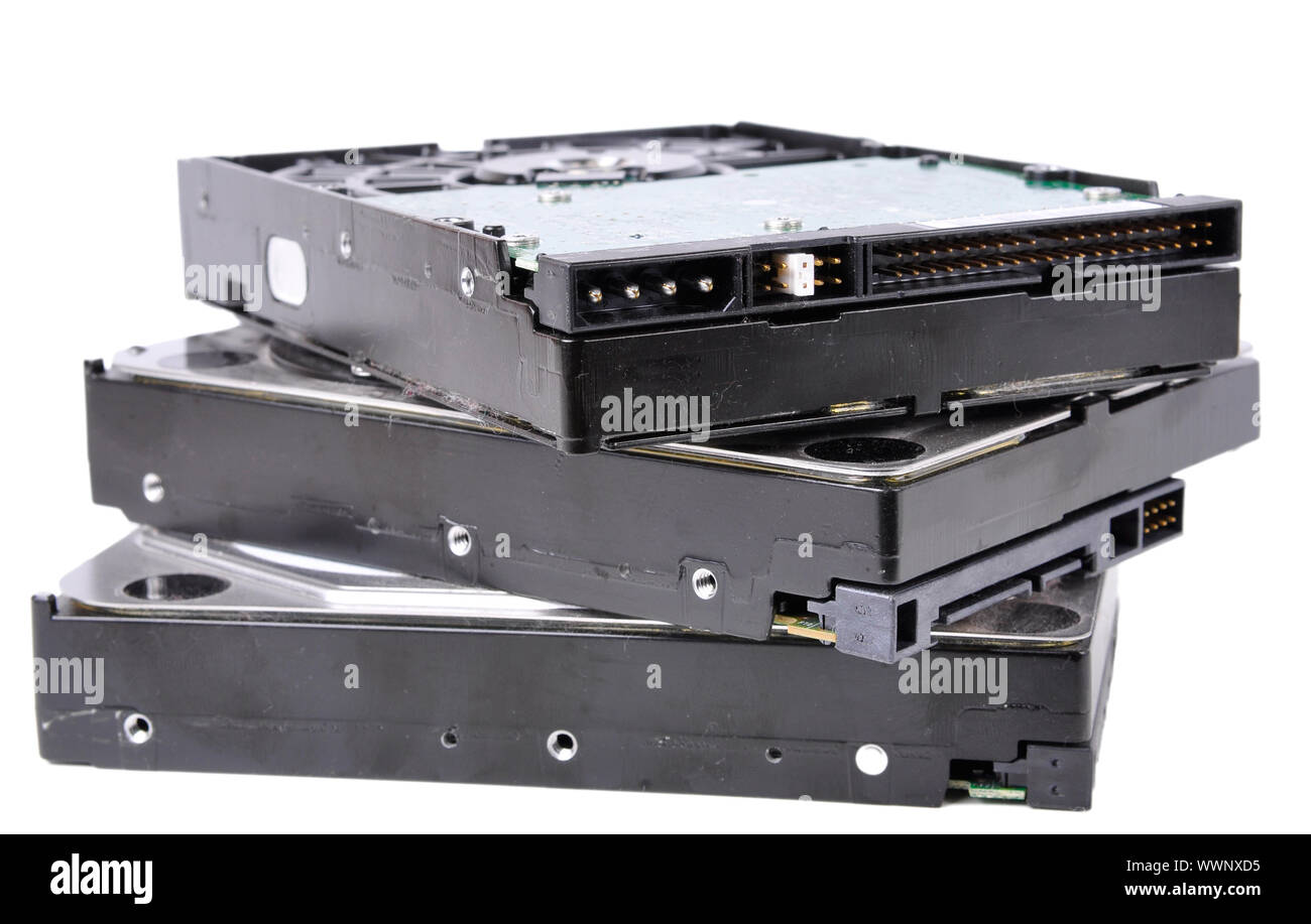 Pile of computer hard drives isolated in a white background Stock Photo ...