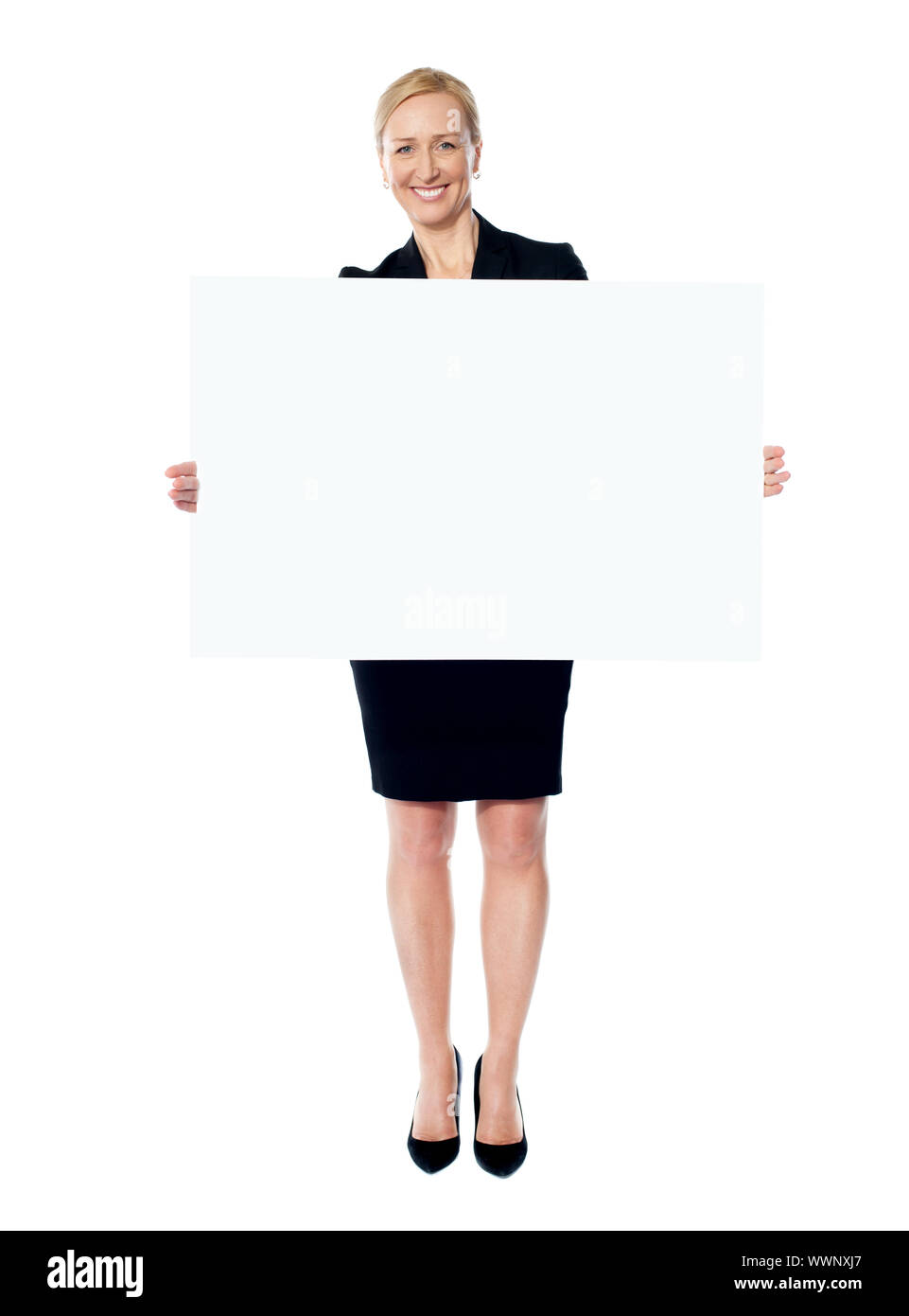 Female business promoter holding white blank banner ad with both hands ...