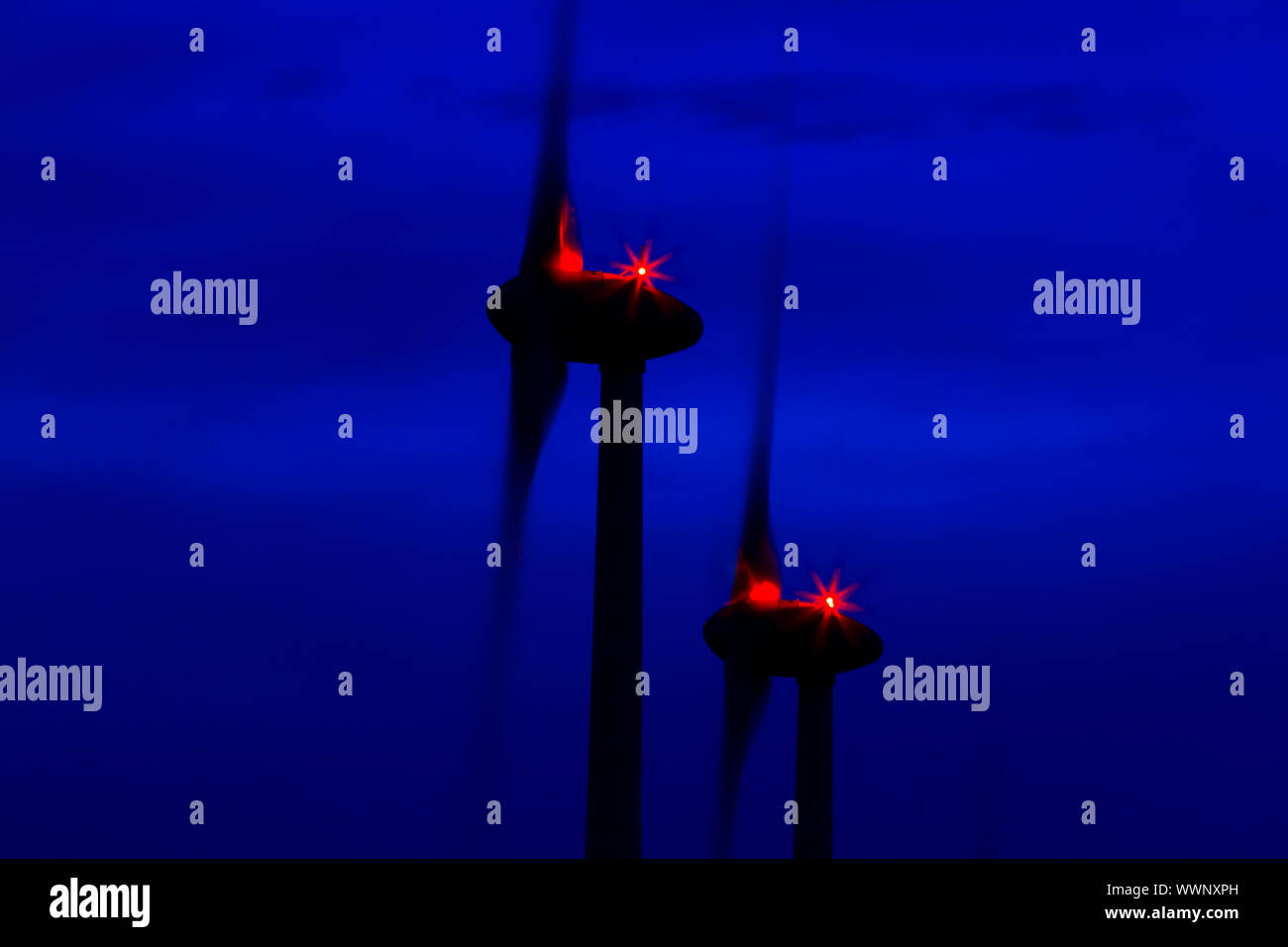 Wind turbine at night Stock Photo - Alamy