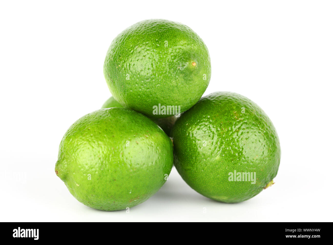 lime pile isolated on white background Stock Photo - Alamy